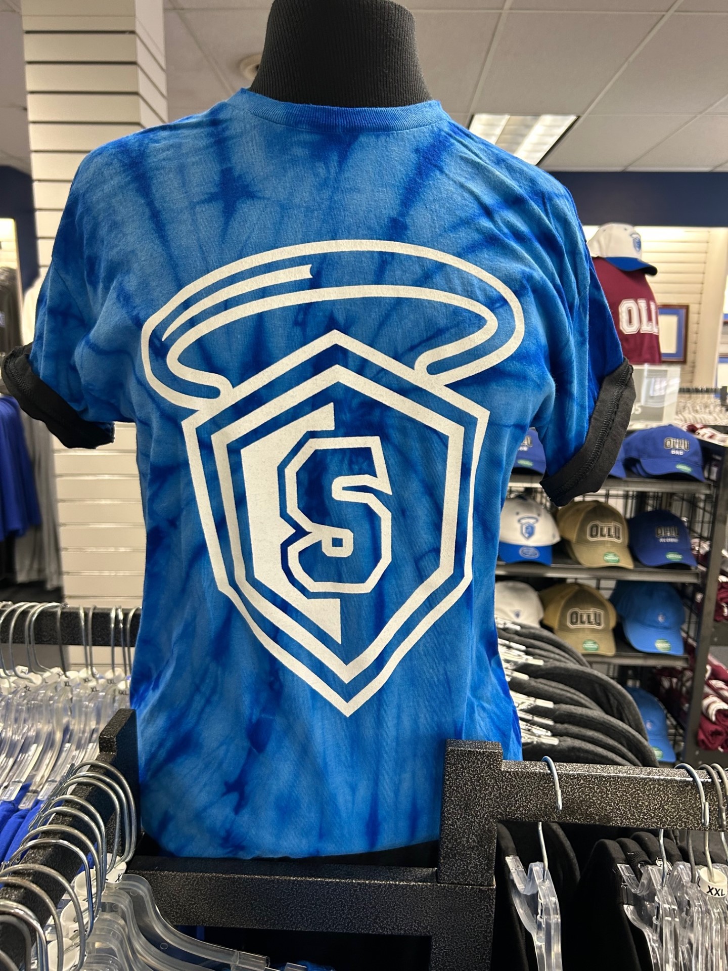 Saints tie-dye t-shirts available in OLLU Bookstore | OLLU Lake Weekly